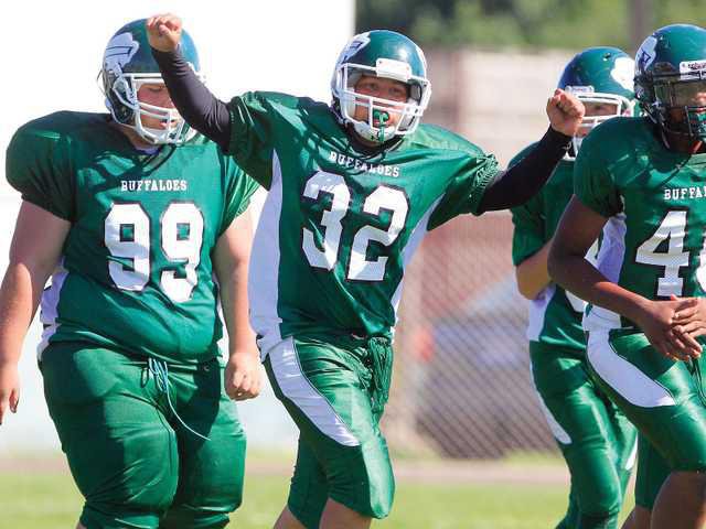 Jr. Buffaloes earn clean sweep in opener - Manteca Bulletin