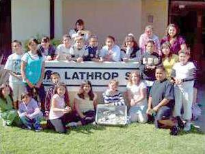 Lathrop School students participate in Walk to School Day, cancer ...
