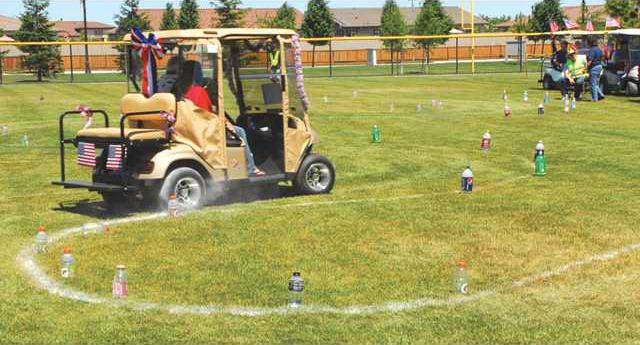Del Webb residents drag race golf carts - Manteca Bulletin