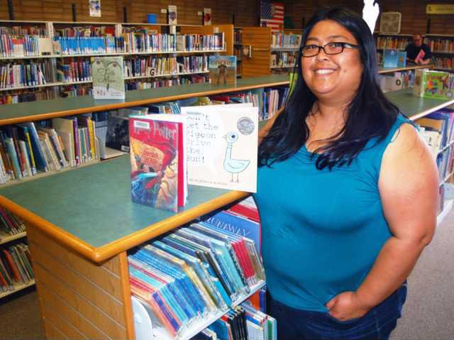 Assistant librarian: Books & eBooks go together like stairs & elevators ...