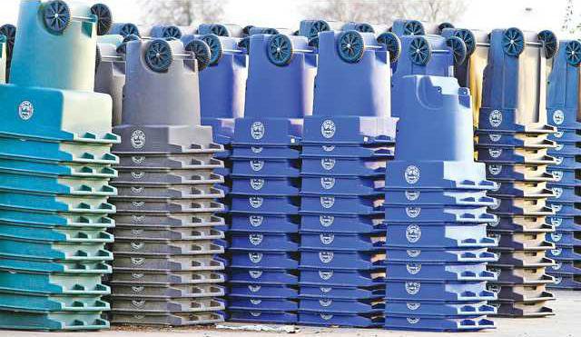 Green garbage folks save green - Manteca Bulletin