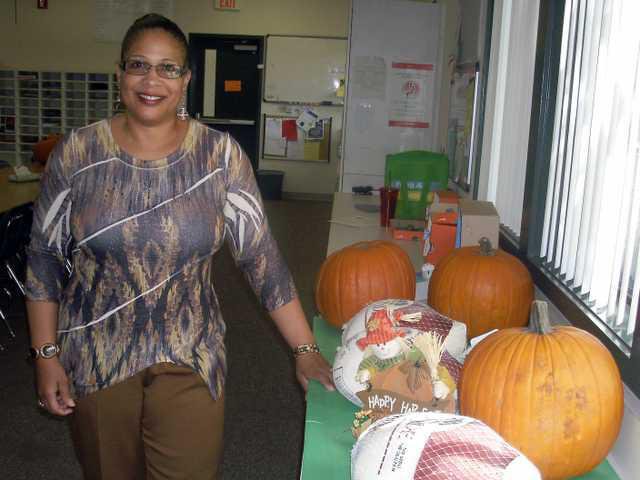 Widmer School staff, students collect 25 turkeys to help struggling ...