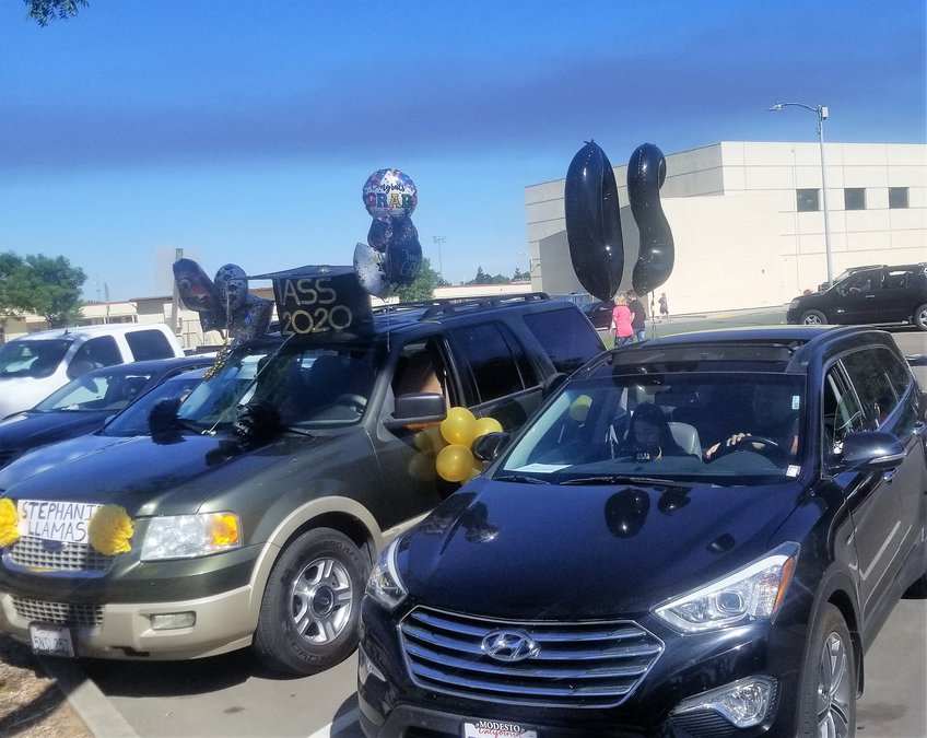 Neil Hafley School drive thru promotes 8th graders - Manteca Bulletin