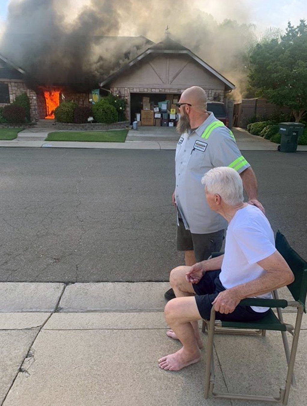 Garbage man hailed as a hero for saving couple from burning house ...