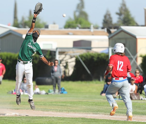 BASEBALL: Up in arms - Manteca Bulletin