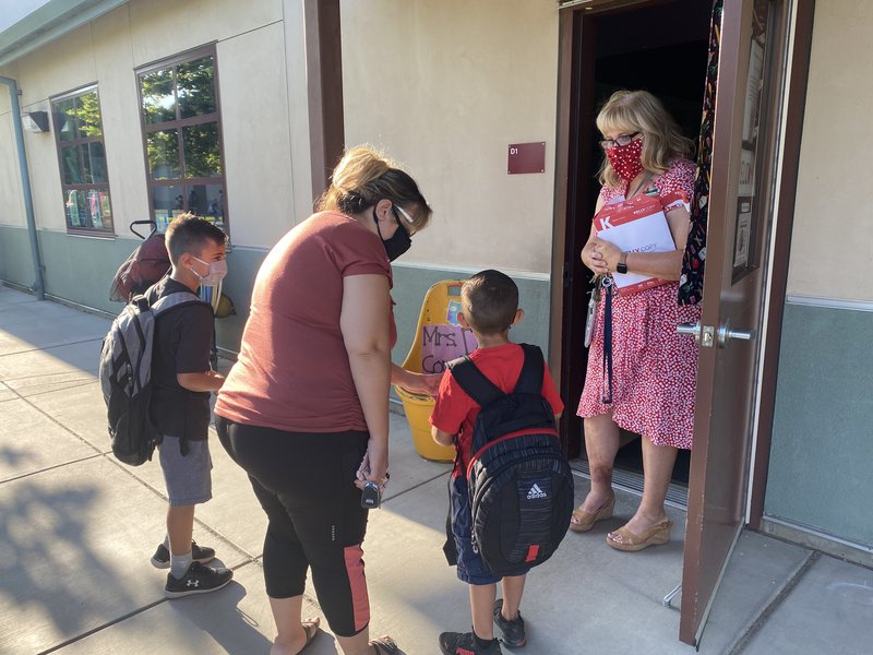 Students, teachers return to school amid mask and vaccine mandates ...