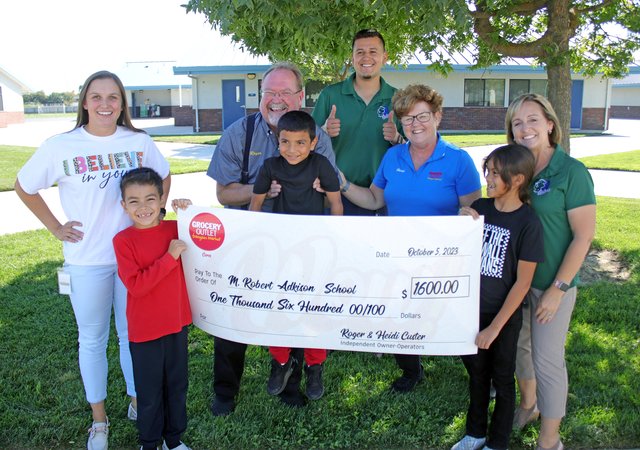 Owners of new store help Adkison School - Ceres Courier