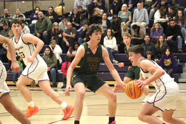 League play officially underway for basketball boys - Escalon Times
